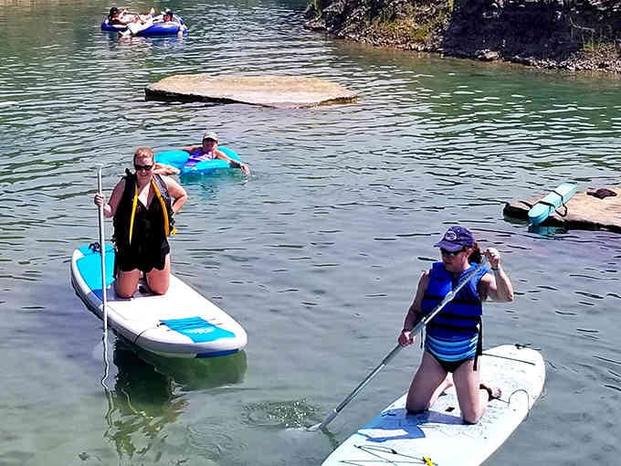Paddleboarding across water this clear feels like floating on liquid sky, minus the expensive tropical vacation.