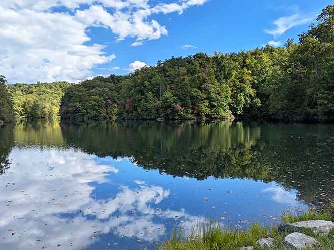 Laurel Lake reflecting the sky so perfectly you'll need a moment to remember which way is up, honestly.