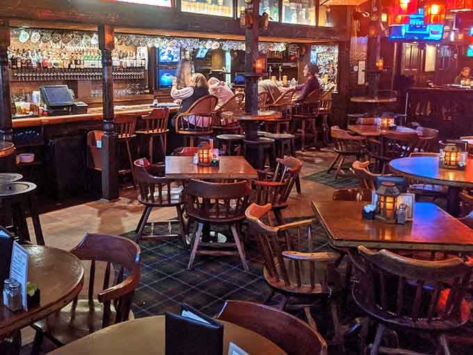 Dark wood, cozy booths, and enough atmosphere to make you forget you're still in Denver, not London.