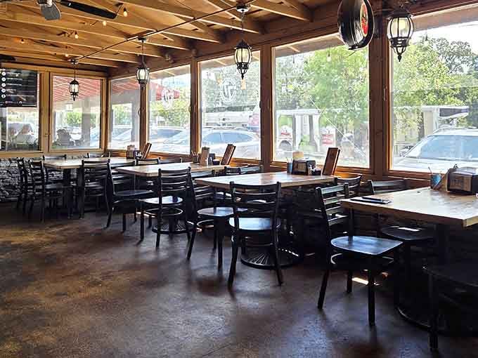 Inside, natural light floods the dining room where burger dreams are about to become delicious, overwhelming reality.