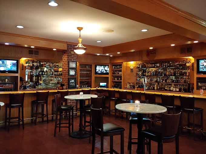 Step into a bar where warm wood meets exposed brick, and suddenly you understand why people linger here for hours.