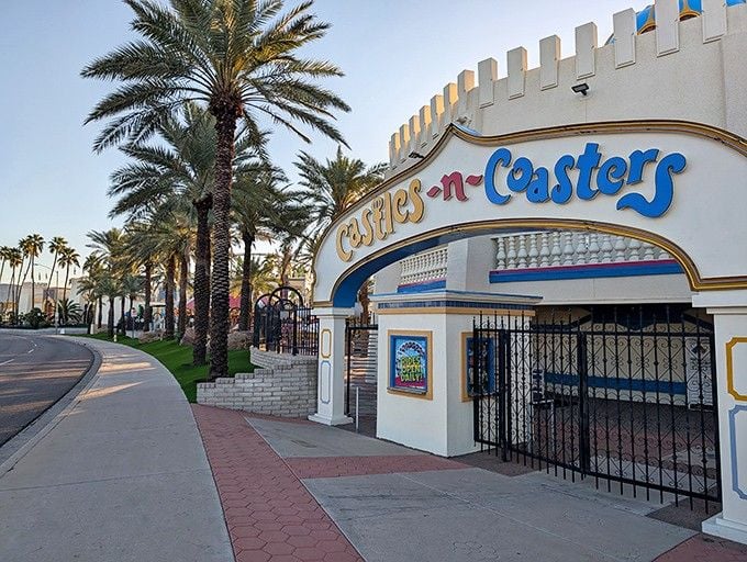 The castle entrance promises medieval charm, but inside you'll find pure American amusement park joy instead.