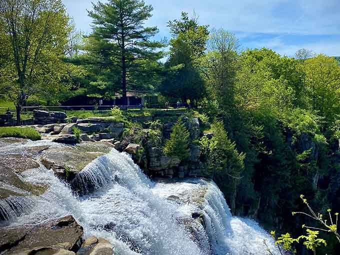 The tiered cascade creates a water show that changes with every season and rainfall, nature's own performance art.
