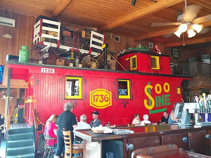 The legendary red caboose sits center stage, ready to transport diners to flavor town without leaving Loretto.