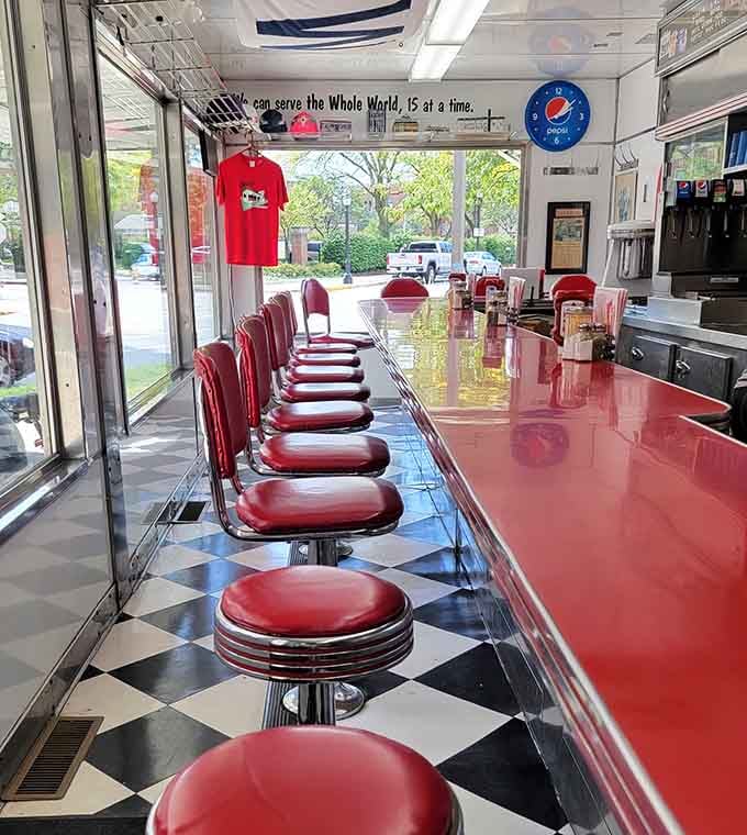 Red vinyl stools and checkered floors: where every seat feels like the best seat in the house.