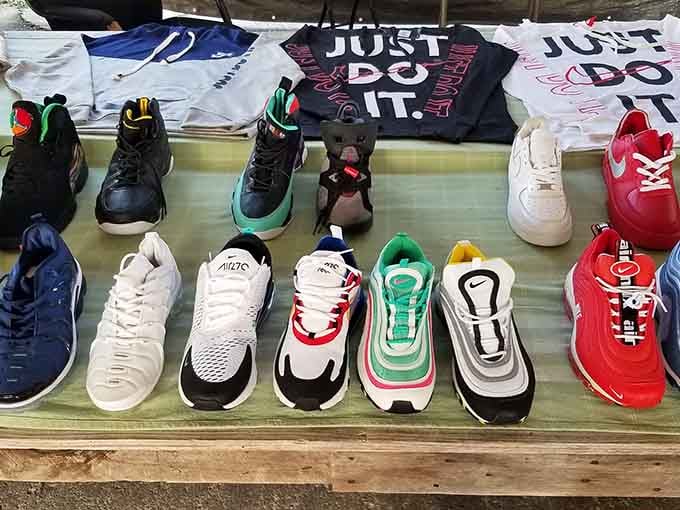 Sneakers lined up like a rainbow of possibilities, from classic whites to bold reds that scream "look at me!"