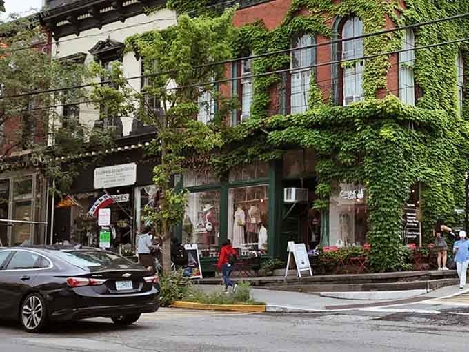 Downtown shops nestle together like old friends sharing secrets, with mountains providing the ultimate backdrop.