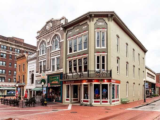 Victorian storefronts huddle together on this corner, their ornate facades whispering tales of when Cumberland rivaled Baltimore.