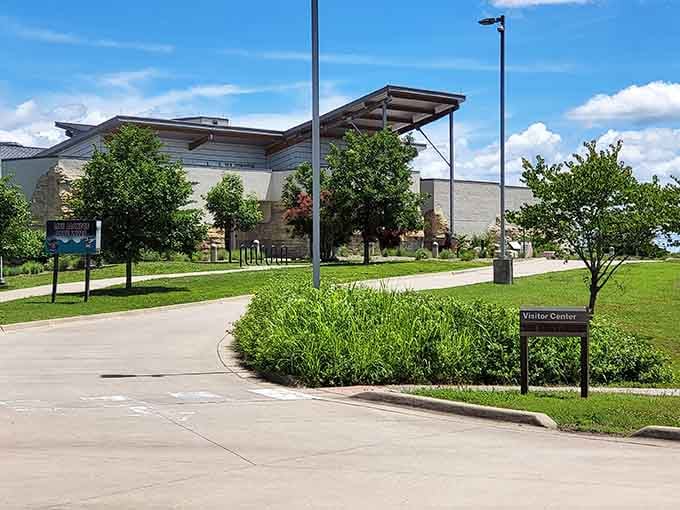 Your GPS brought you here for brochures, but those sweeping rooflines hint at something special waiting inside.