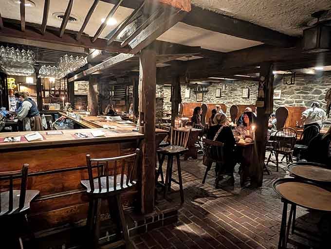 Candlelight, exposed beams, and stone walls create ambiance that interior designers spend fortunes trying to replicate.