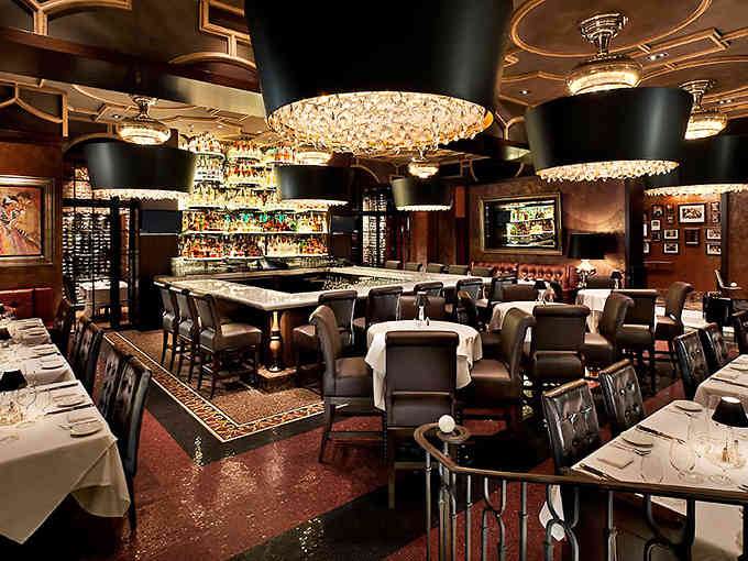 Crystal chandeliers and leather seating create an atmosphere where your steak arrives feeling as fancy as you suddenly do.