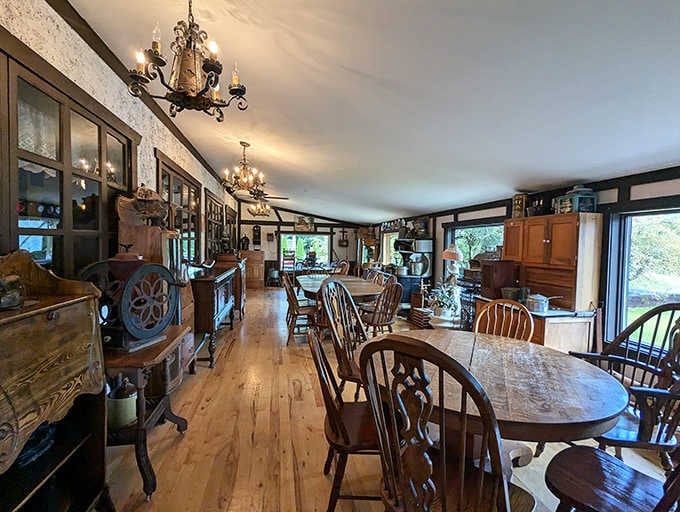 Wrought iron chandeliers and warm wood tones create an atmosphere where time slows down and conversations linger.