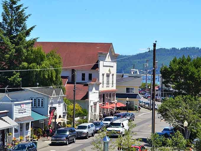 Colorful storefronts cascade down the hillside like a coastal Mayberry with better coffee and ocean views.