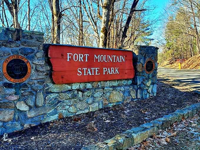 That rustic stone entrance tells you everything: adventure ahead, cell service behind, priorities exactly where they should be.