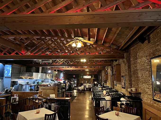 Those soaring red beams and rustic brick walls set the stage for a dining experience worth savoring.