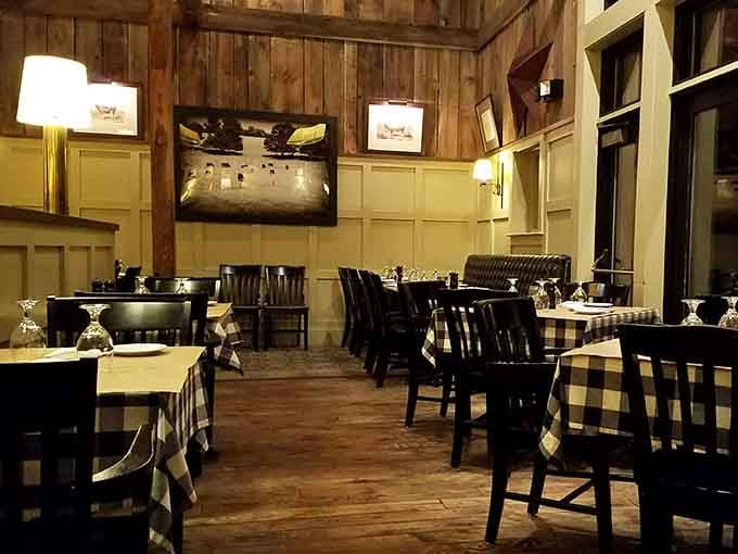 Exposed beams and warm lighting create an atmosphere where rustic meets refined without trying too hard.