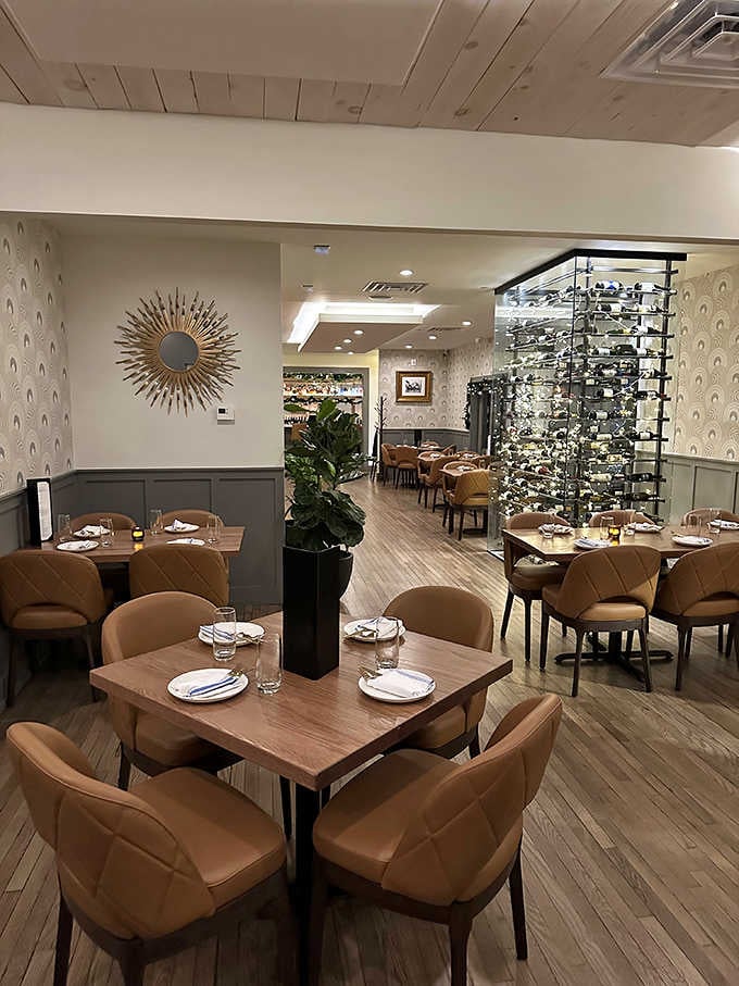 Warm wood tones and contemporary comfort create a dining room that feels both special and welcoming.