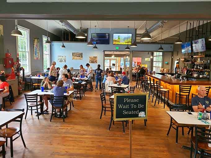 Inside, the buzz of happy diners and industrial-chic vibes create the perfect atmosphere for serious eating.