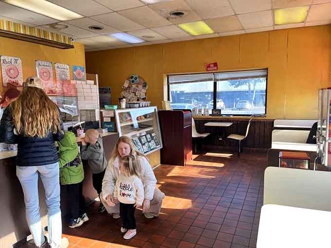 Sunlight streaming through the windows makes everything better, especially when you're surrounded by fresh donuts and possibilities.