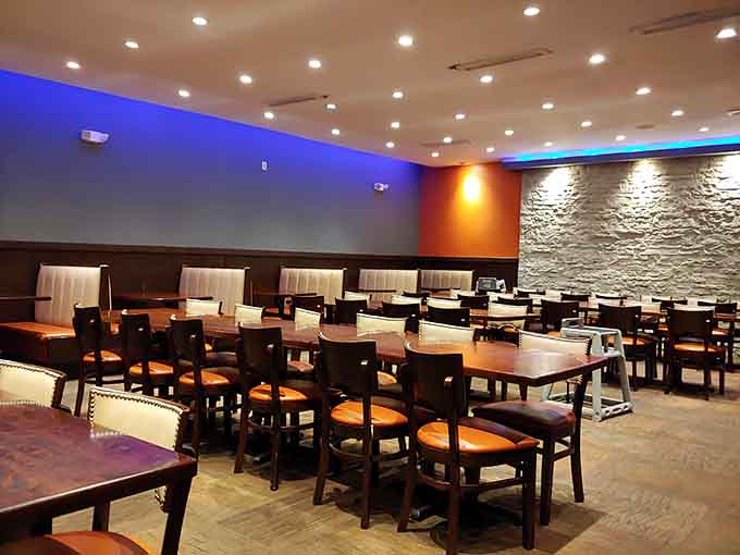 Blue accent lighting and comfortable seating create an atmosphere where overeating feels downright sophisticated and classy.