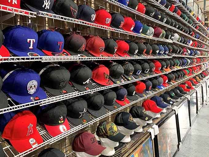 Baseball caps stretching into infinity, representing every team from the majors to teams you forgot existed entirely.