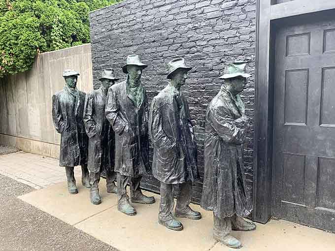 These bronze figures waiting in line prove that even art knows the value of patience and good company.