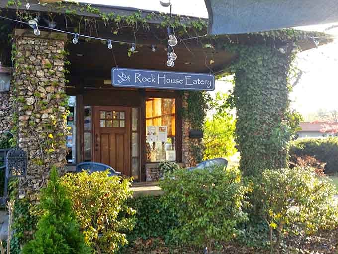 The Rock House Eatery sits tucked behind greenery like a delicious secret your best friend finally decided to share.