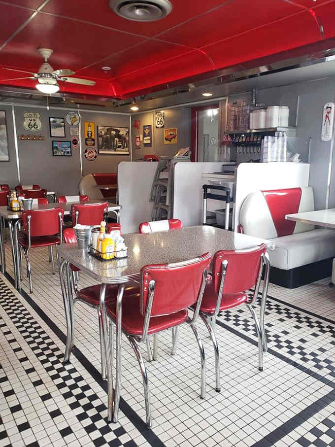 Red vinyl, chrome accents, and checkered floors create a symphony of retro perfection your eyes won't forget.