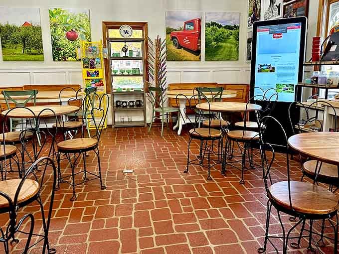 The brick floor and cafe-style seating create the kind of cozy atmosphere where time slows down and worries fade away.