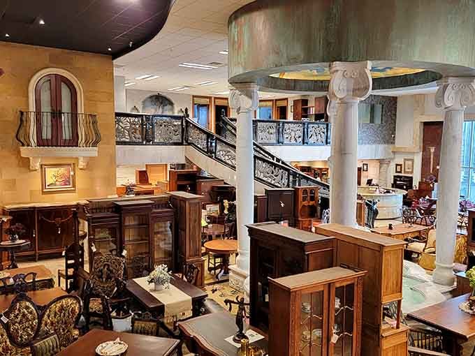 Two floors of gorgeous antiques, ornate ironwork, and columns that belong in a European palace.