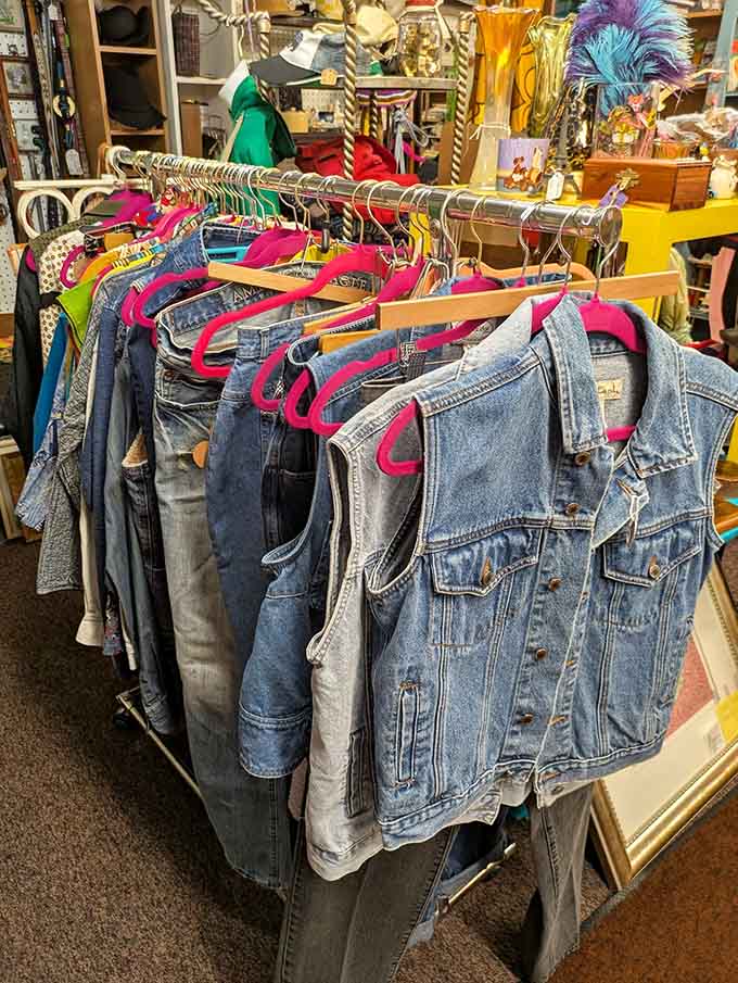 Denim jackets hanging like a timeline of American casual wear, each fade telling its own story.