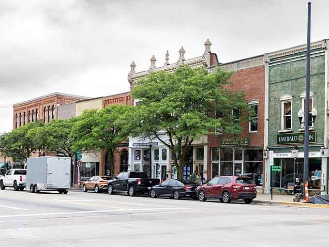 Downtown streets lined with historic buildings and leafy trees create the perfect backdrop for festival season magic.