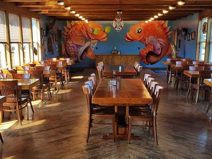 Those colorful fish on the wall seem almost as excited about dinner as you're about to be.