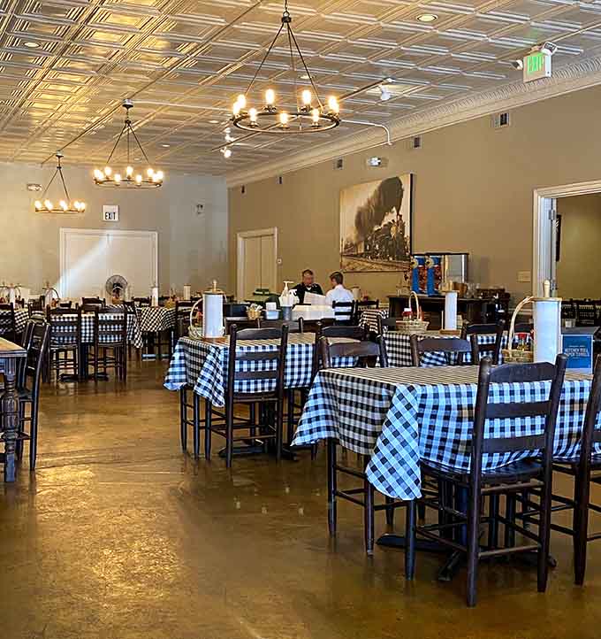 Those checkered tablecloths and pressed tin ceiling create the kind of authentic Southern atmosphere you simply cannot fake.