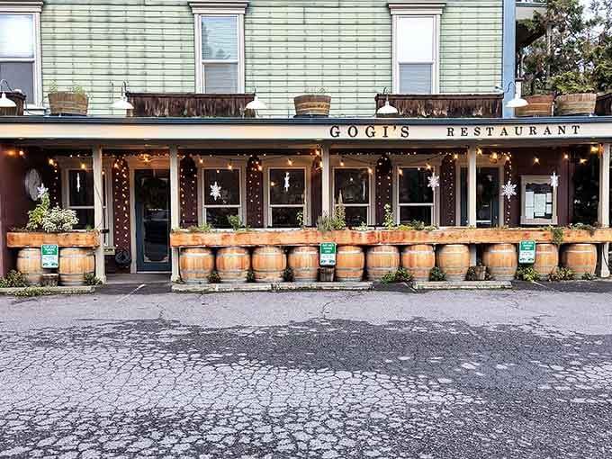 Gogi's proves that wine barrels make excellent outdoor seating companions when you're dining in a town that takes history seriously.