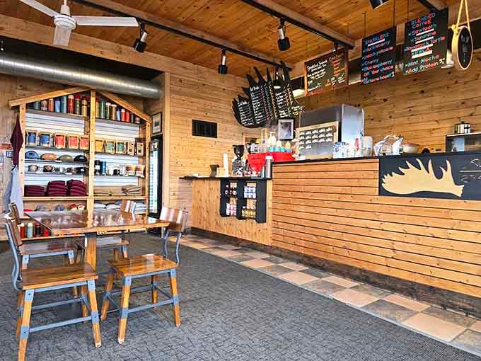 Wood paneling and espresso machines living together in perfect harmony, like a cabin that finally got cultured.