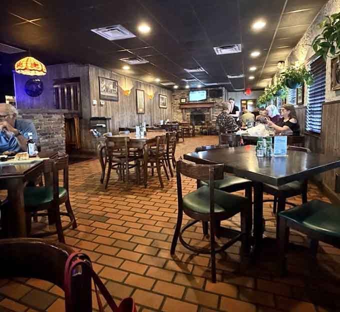 Tiffany lamps and brick accents create that perfect neighborhood steakhouse vibe where comfort meets quality dining.