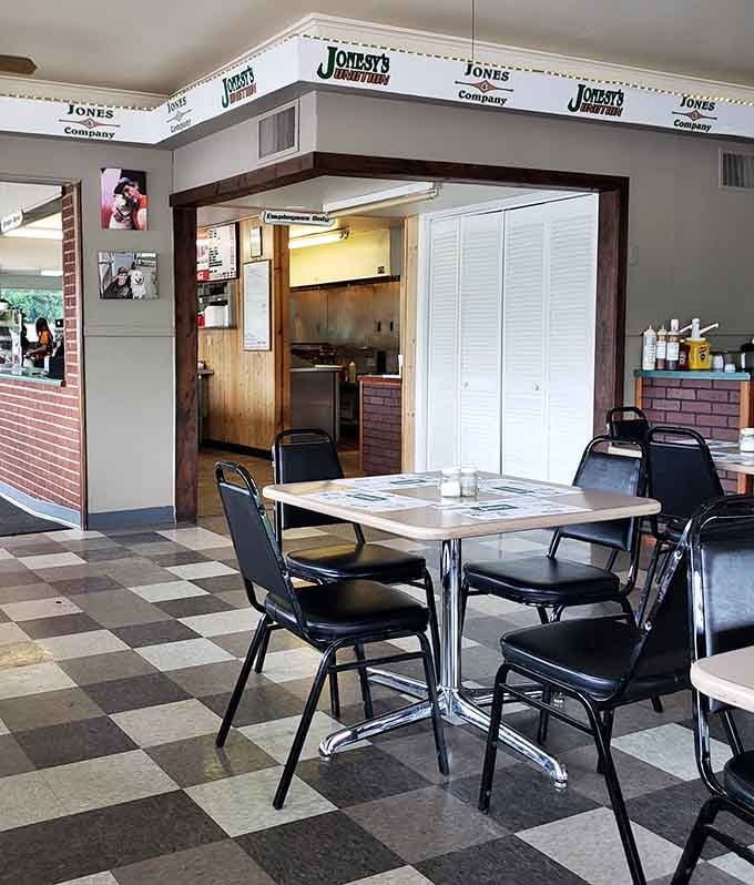 That classic checkered floor and simple seating arrangement tell you everything: this place prioritizes what's on your plate.
