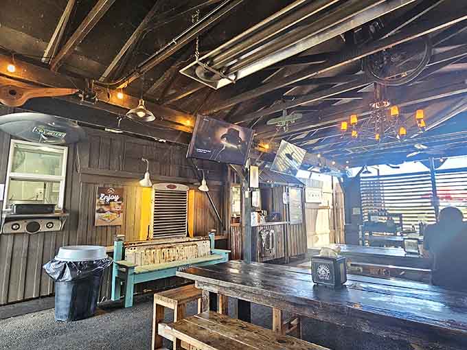 Industrial chic meets roadhouse charm in a space that proves corrugated metal can absolutely be cozy.