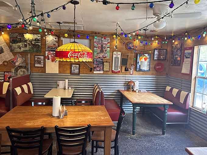 String lights and vintage Coca-Cola memorabilia create the kind of cozy atmosphere that makes you want to stay awhile.