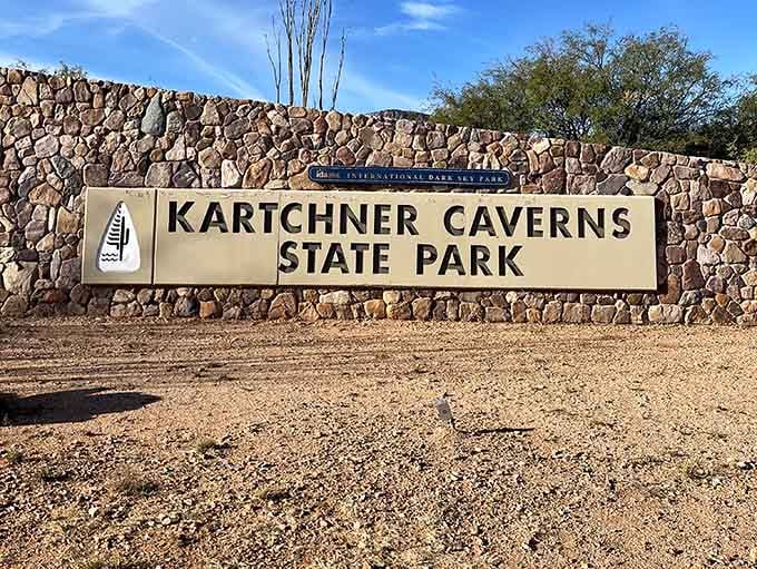 The stone sign welcomes you to underground wonders that make your basement look decidedly less impressive by comparison.