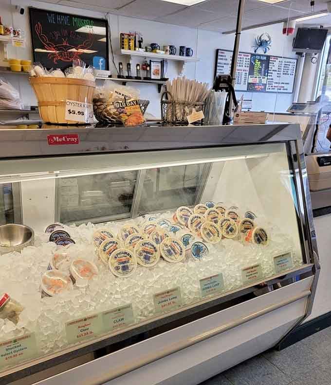 Fresh seafood gleaming on ice like edible jewels, this is where the magic begins before it hits your plate.