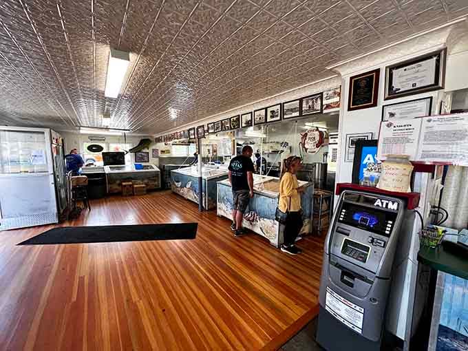 The tin ceiling and no-frills counter setup prove that when you've got great seafood, fancy decor is just a distraction.