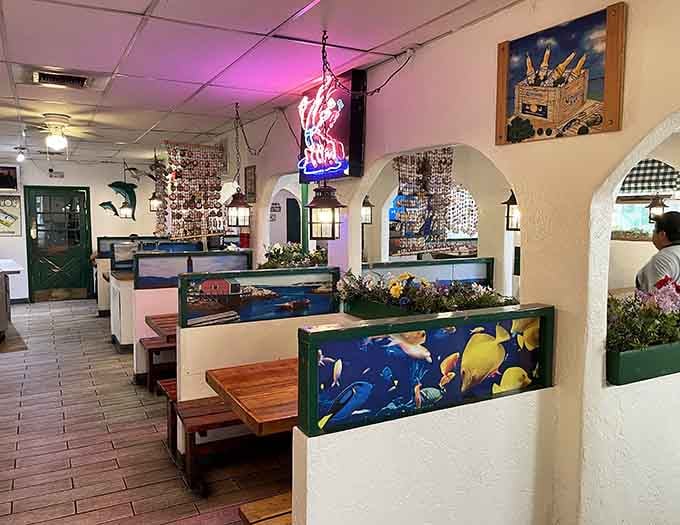 Step inside and suddenly you're underwater, surrounded by tropical fish murals and that unmistakable coastal charm.