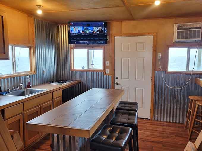 Where corrugated metal meets coastal charm, and your dining table comes with panoramic water views included.