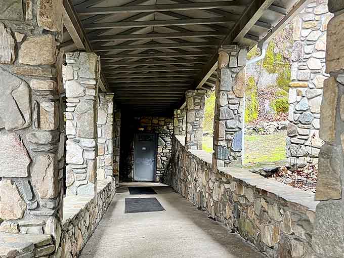 Stone archways frame your journey into the mountain, where nature's architecture puts human designers to shame every single time.