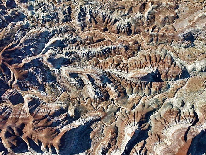 From above, the formations look like wrinkled fabric on Earth's unmade bed, beautifully chaotic and utterly mesmerizing.