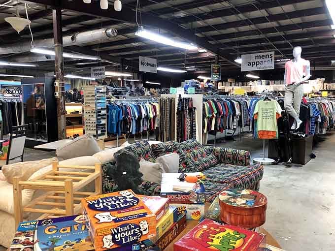 Racks stretching into infinity like a clothing lover's fever dream, organized enough to actually find things.