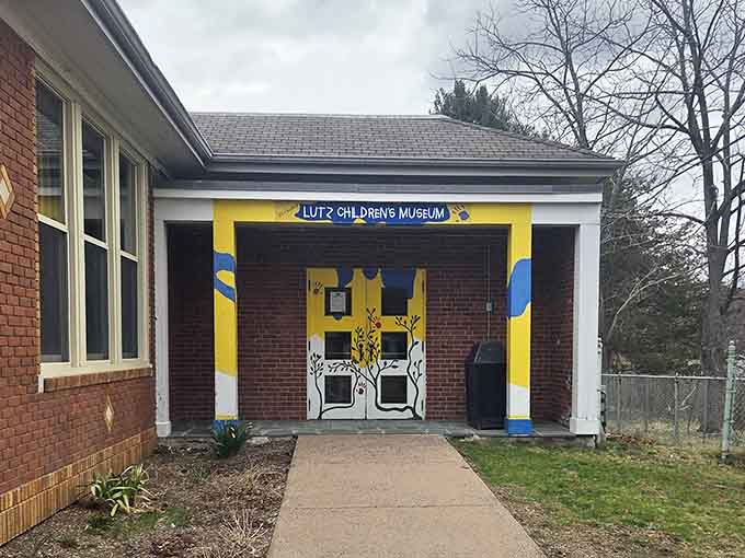 That cheerful giraffe-painted entrance promises adventures where imagination runs wild and learning feels like pure play.
