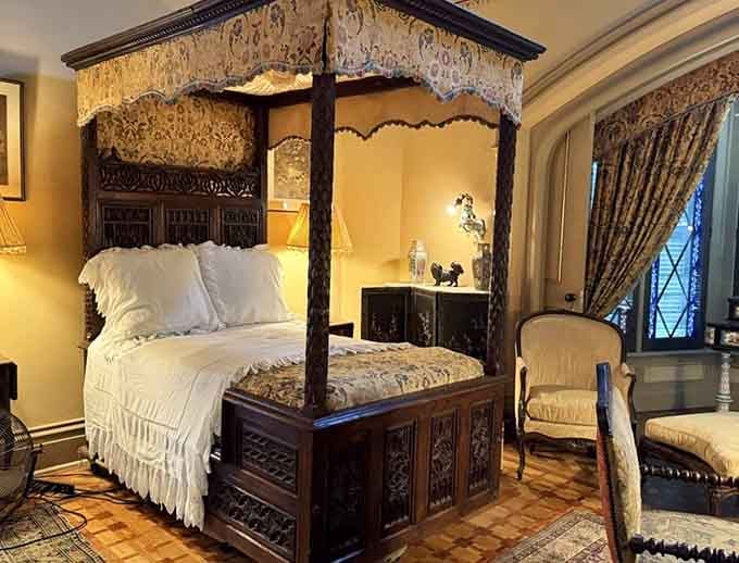 Sleep like a Gilded Age tycoon in a four-poster bed that's fancier than most people's entire houses.